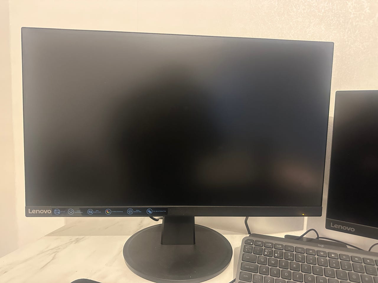 Desktop including two Lenovo monitors, Logitech keyboard and mouse ...