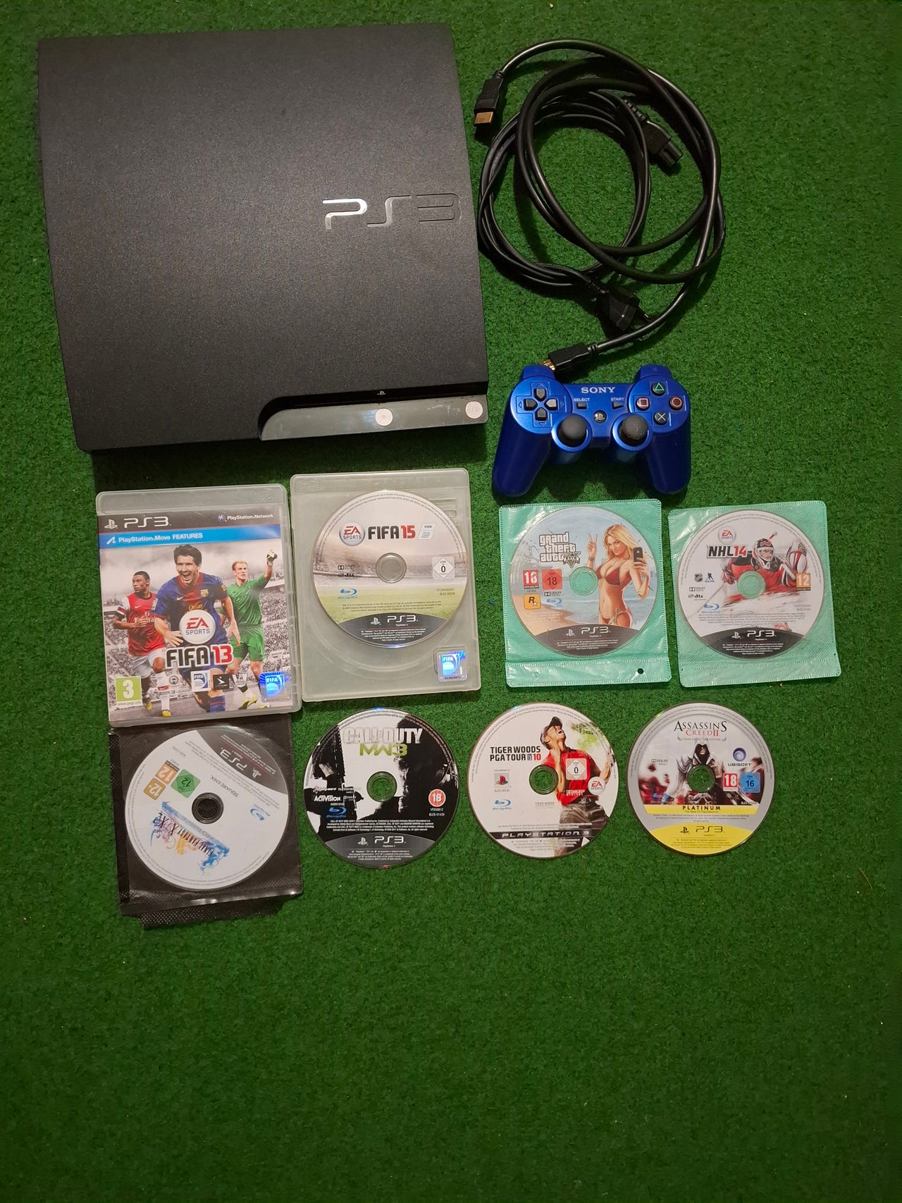 Sony PlayStation 3 Slim Spelkonsol med handkontroll och spel | Blocket