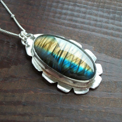 Hängsmycke med Rutile Quarts och Grossular Garnet | Blocket