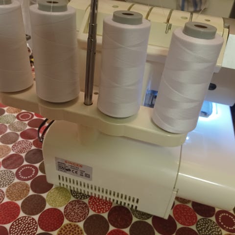 Singer 14SH754 Overlock symaskin vit | Blocket
